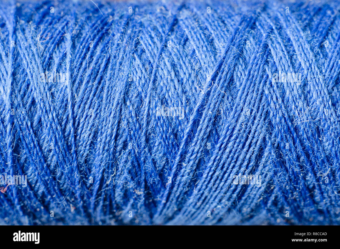blue thread as a background Stock Photo - Alamy