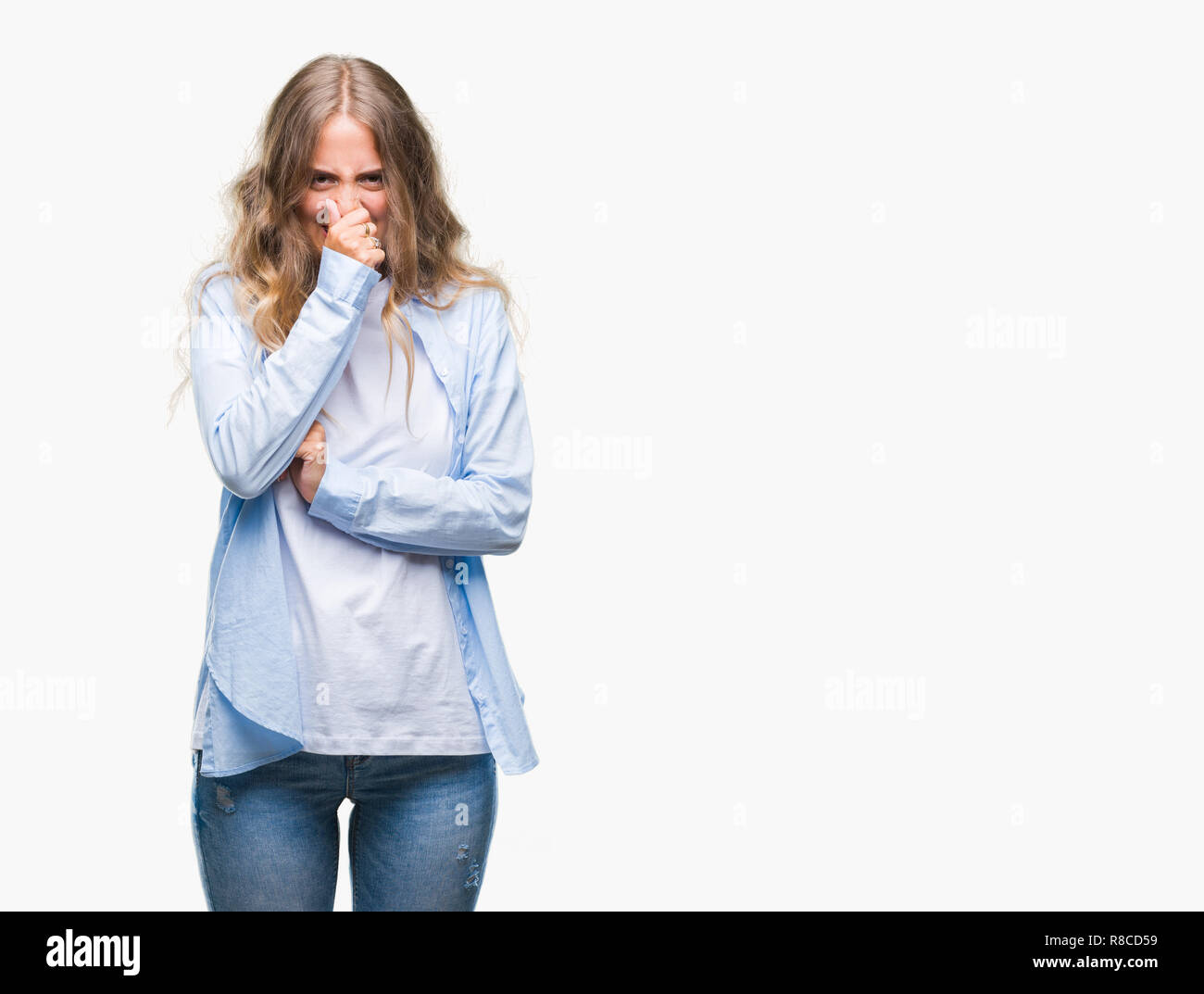Beautiful Young Blonde Woman Over Isolated Background Smelling