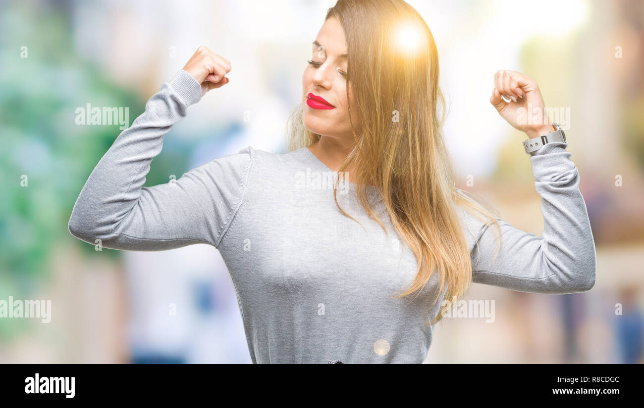 Young beautiful worker business woman over isolated background showing ...