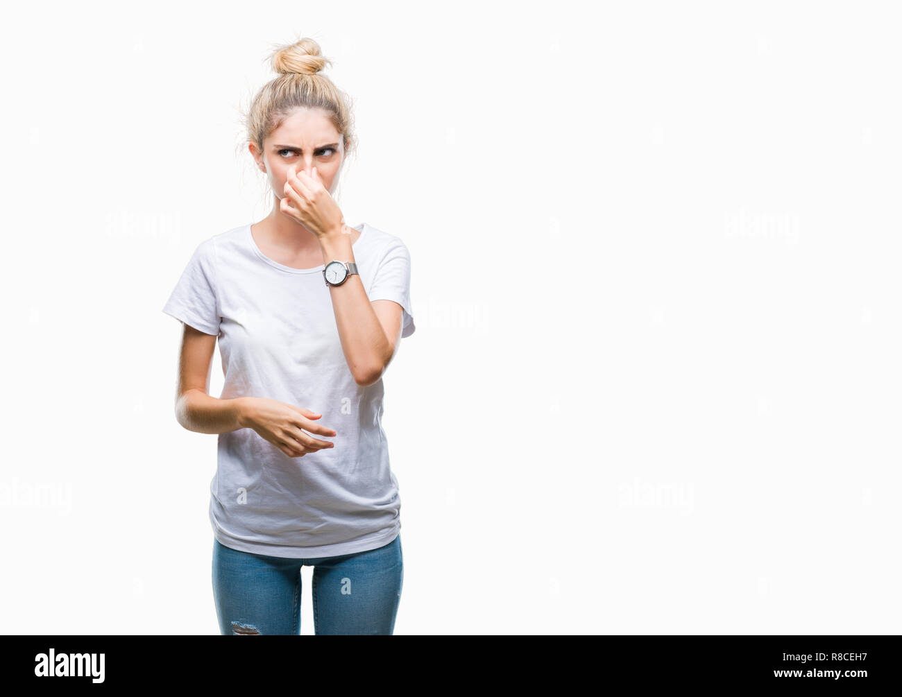 Young beautiful blonde woman wearing white t-shirt over isolated ...