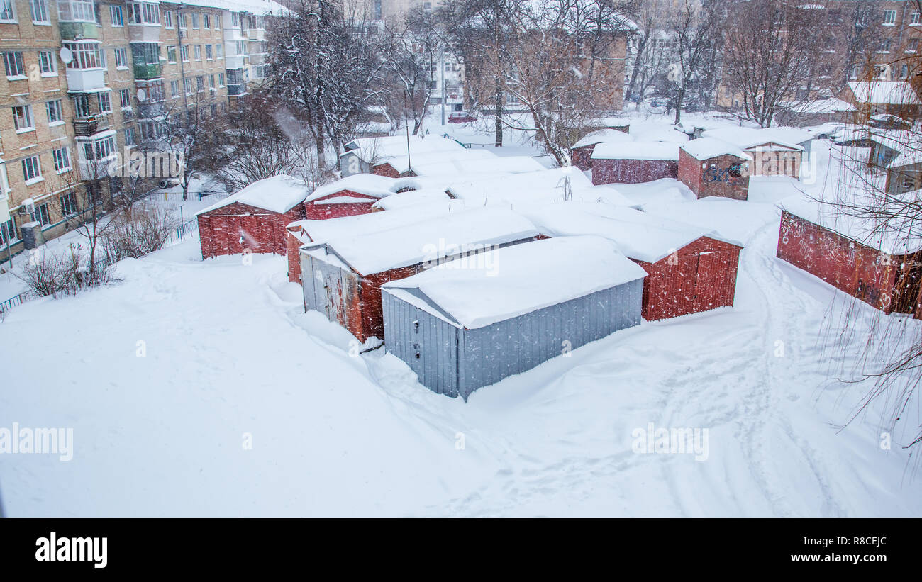 Garage for a car covered with white snow. Winter holiday background ...