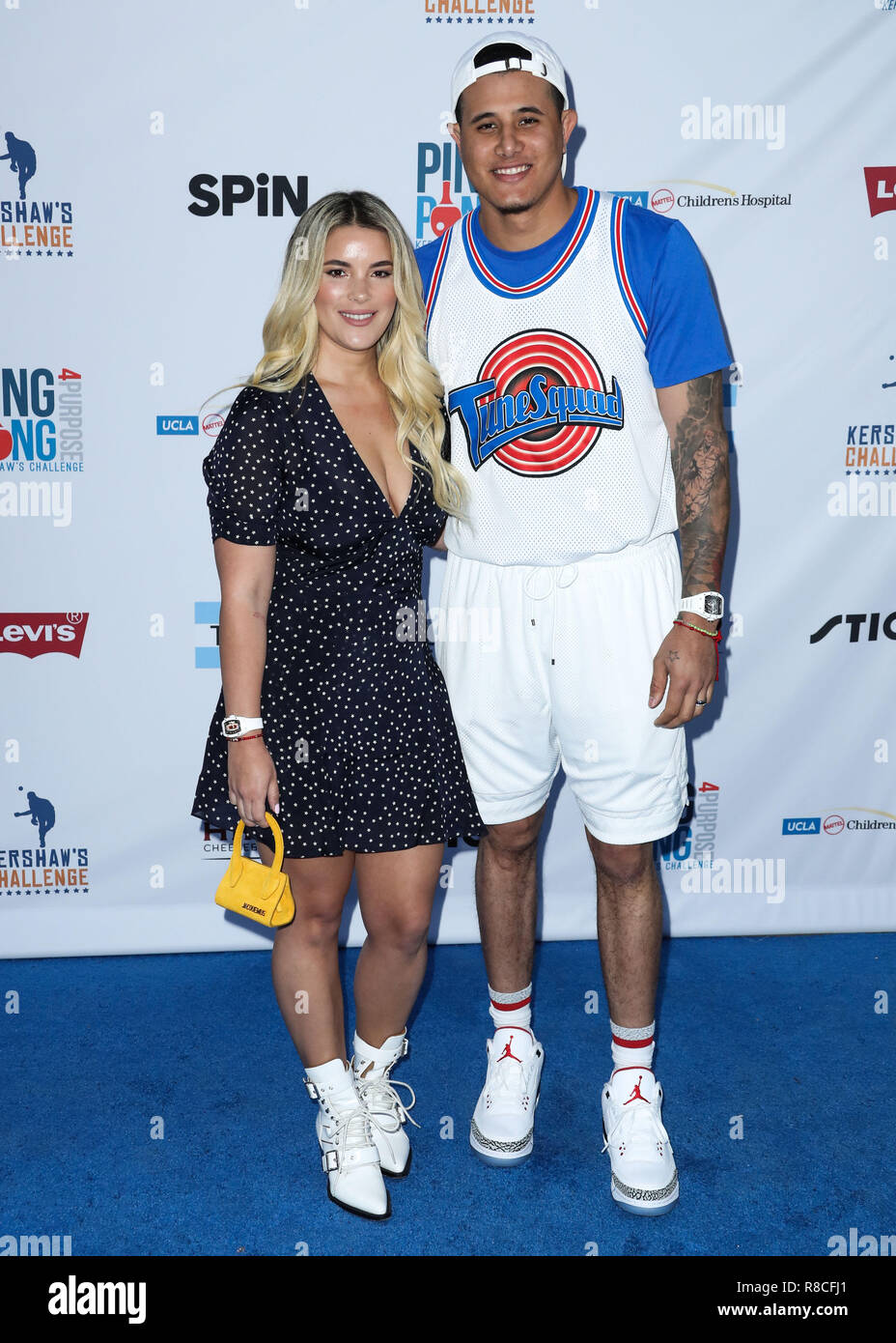 LOS ANGELES, CA, USA - AUGUST 23: Manny Machado, Yainee Alonso at the ...