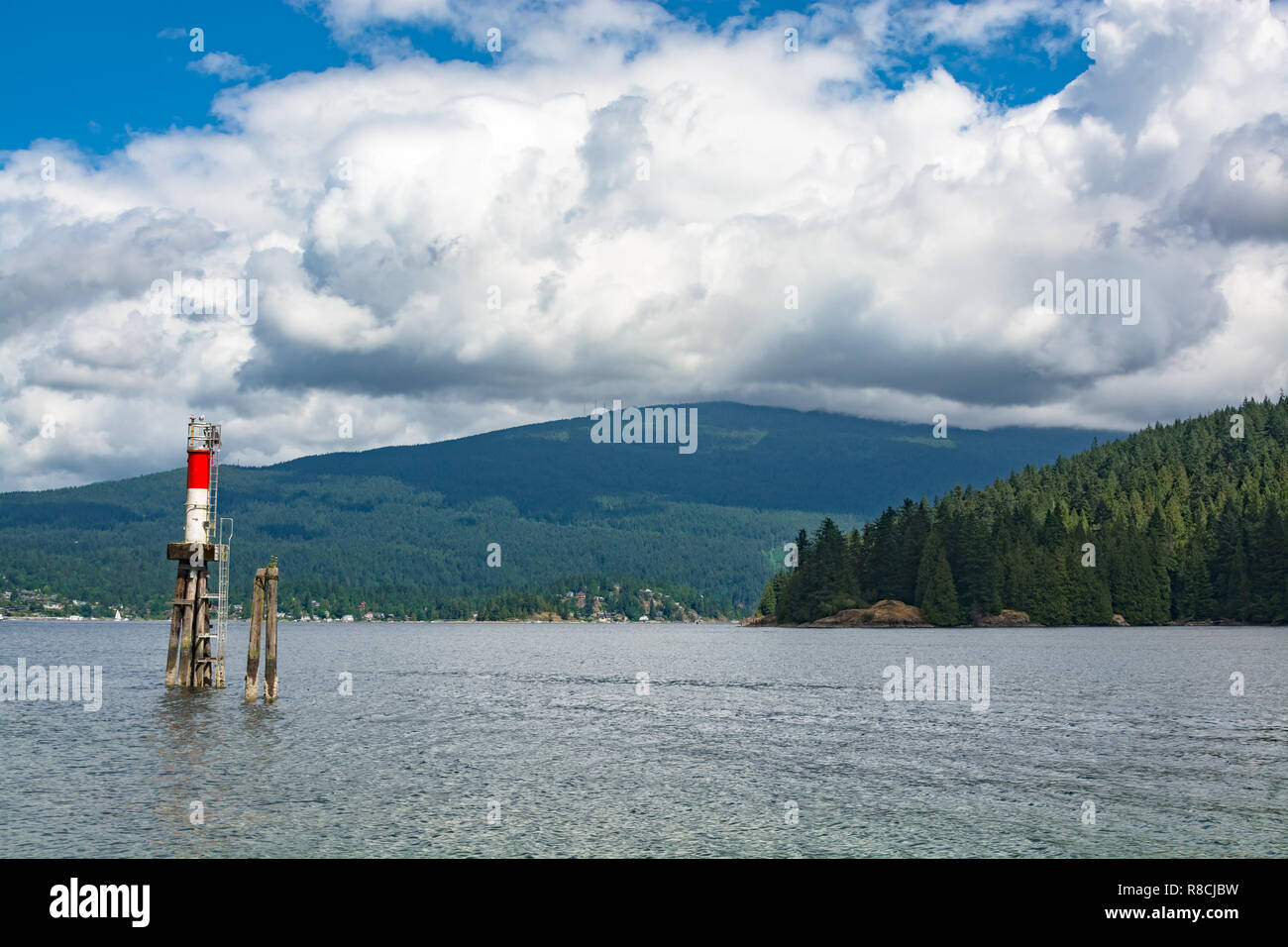 Beautiful view over ocean harbor with ship channel light in Vancouver ...