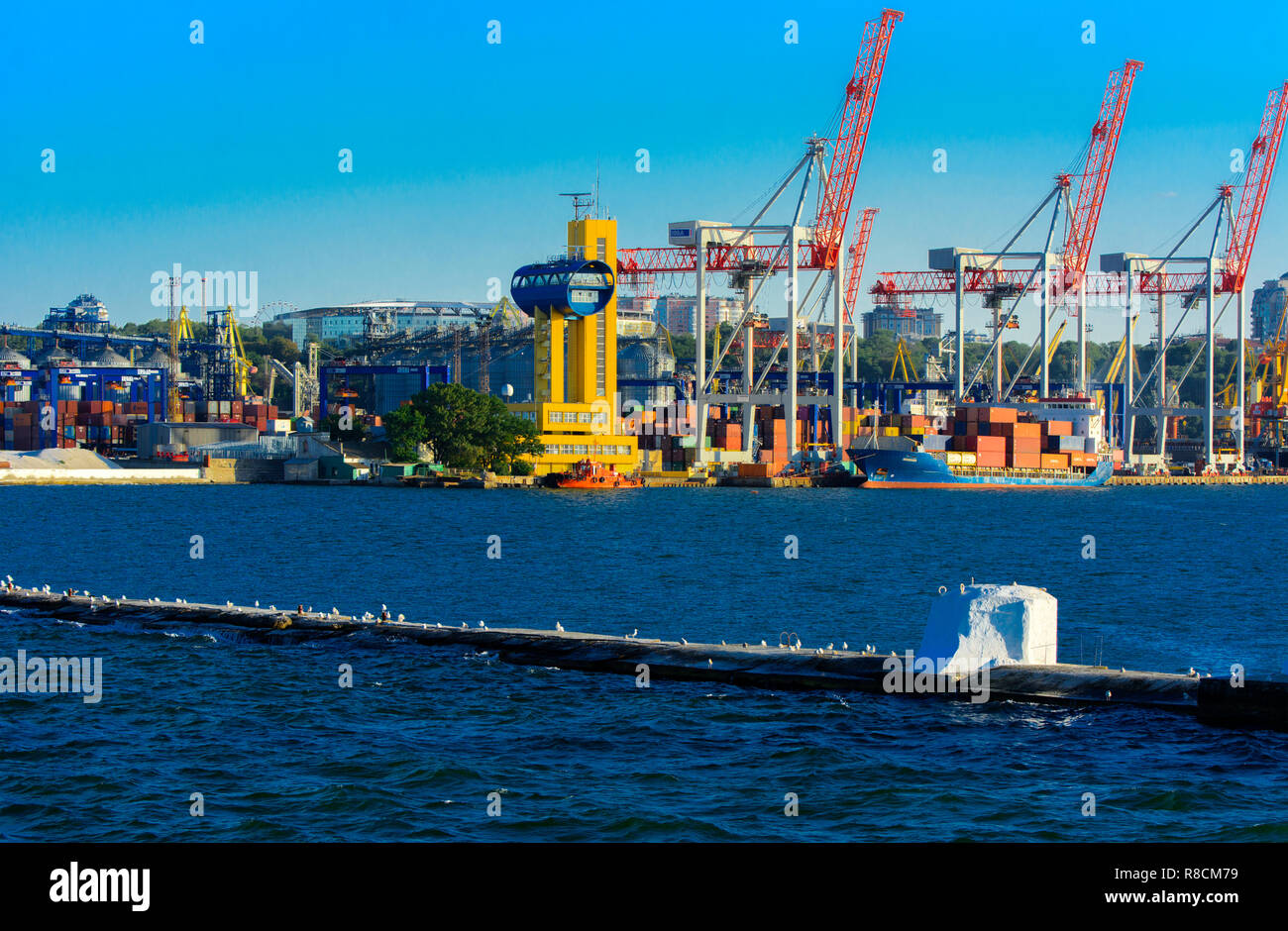 Odessa, Ukraine - August 8, 2018. Big working cranes for loading ...
