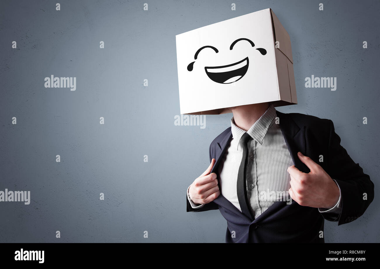 Funny man wearing cardboard box on his head with smiley face Stock ...