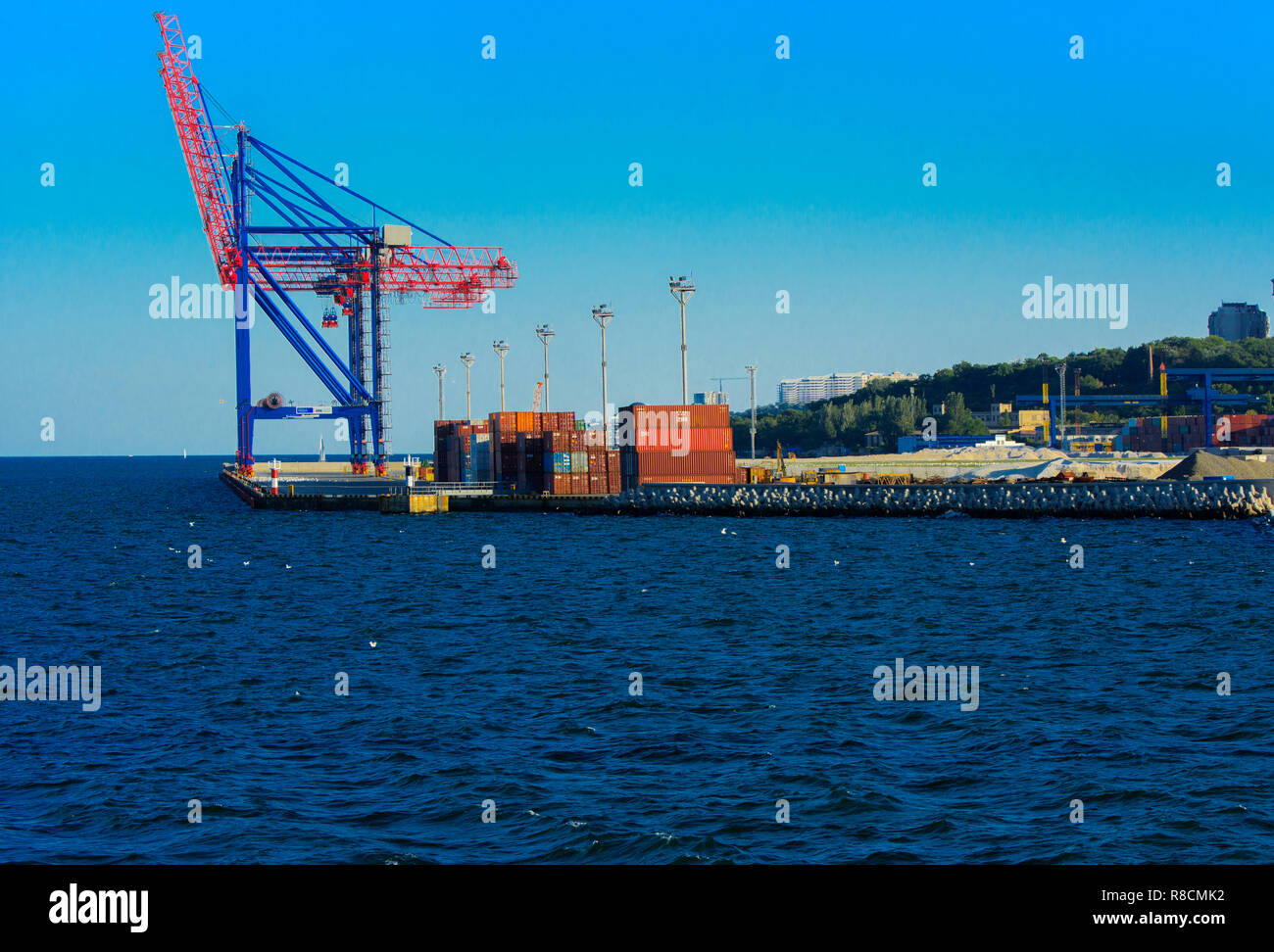 Odessa, Ukraine - August 8, 2018. Big working cranes for loading ...