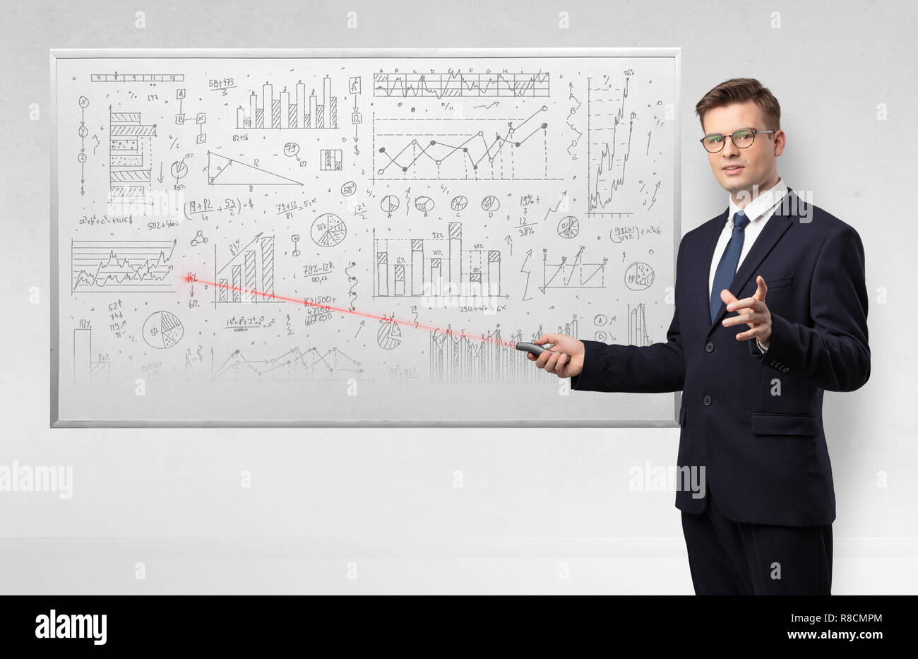 Professor with laser pointer teaching geometry Stock Photo - Alamy