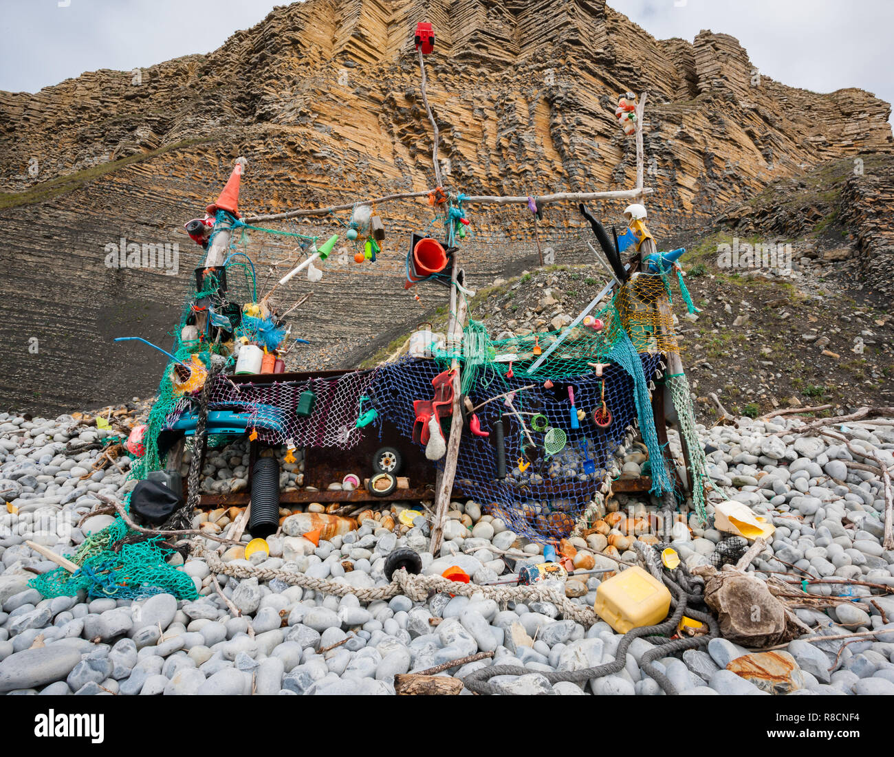 Mock shelter made of plastic rubbish discarded fishing gear and ...