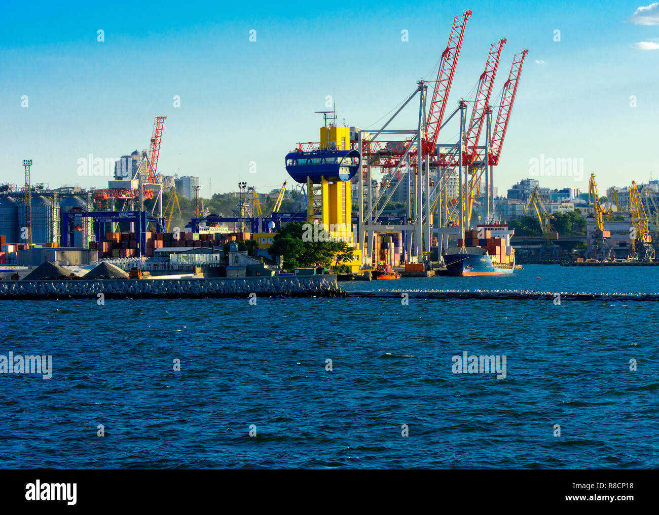 Odessa, Ukraine - August 8, 2018. Big working cranes for loading ...