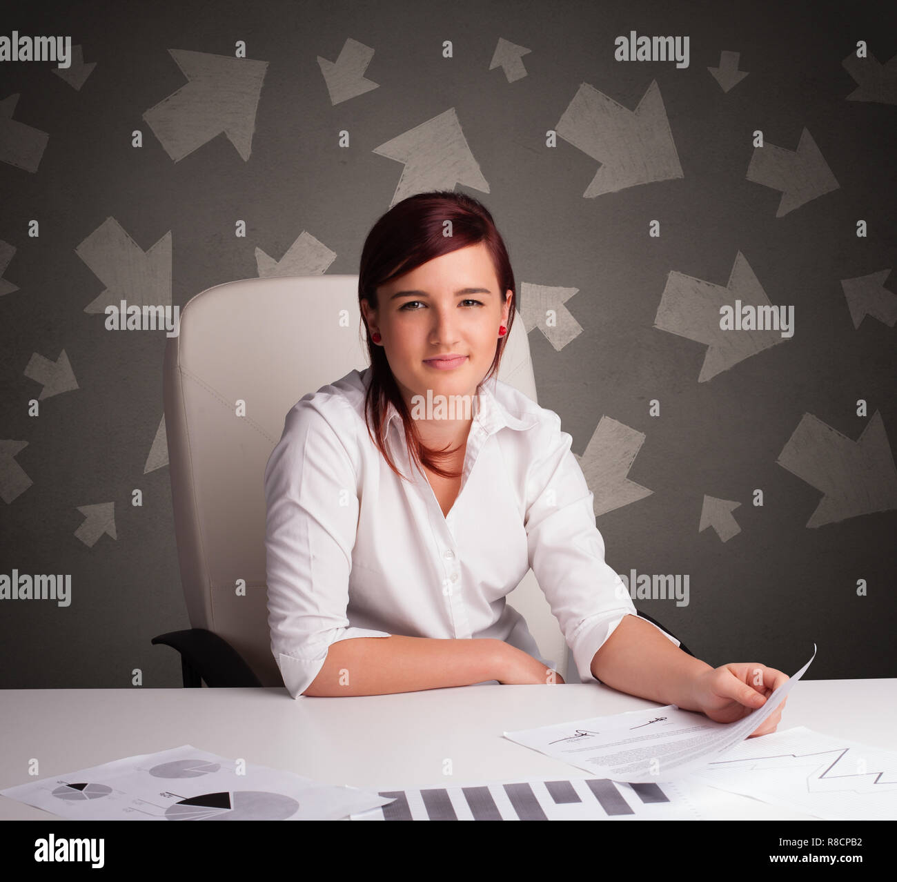 Manager in front of the office desk with different direction concept ...