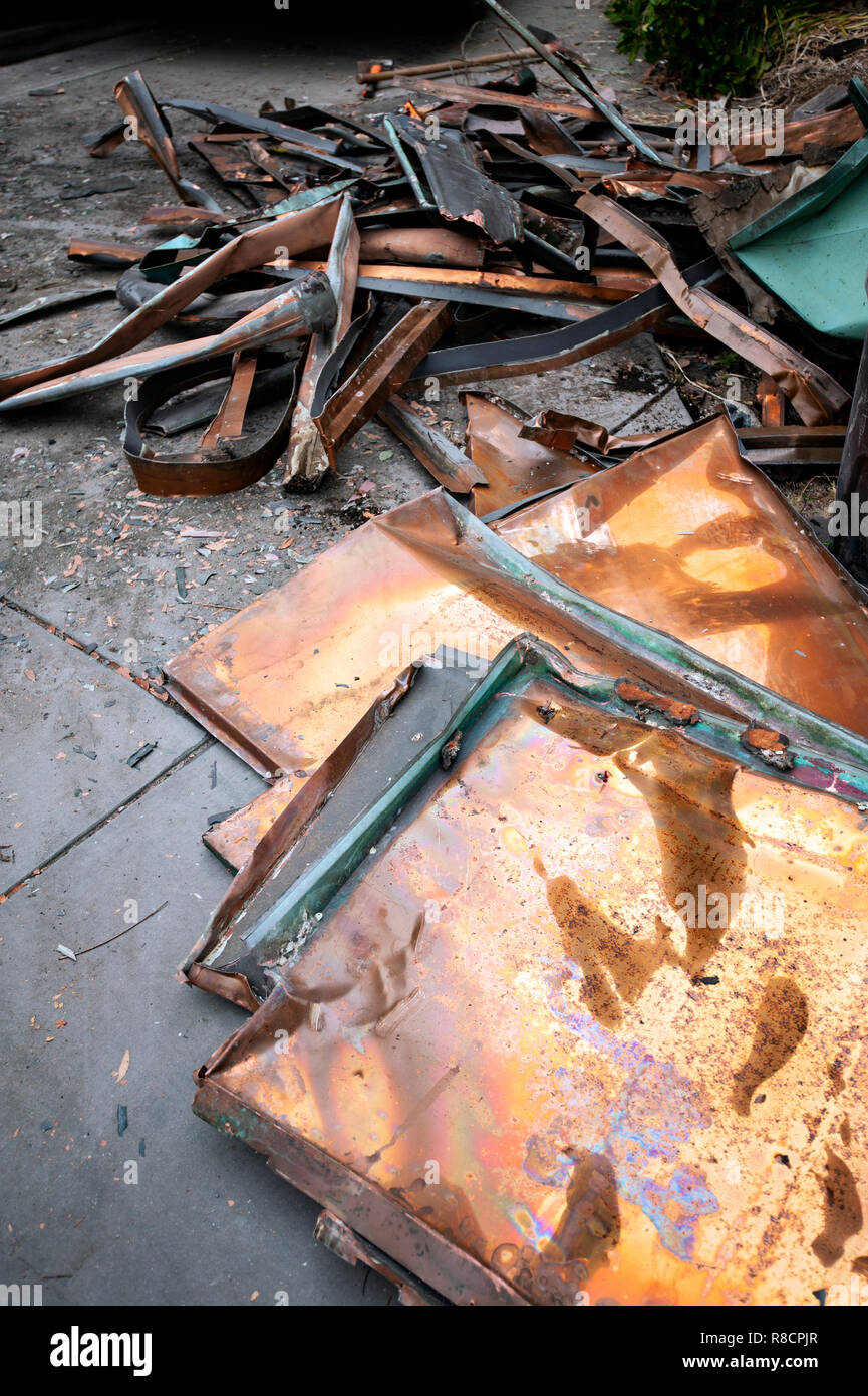 Demolition and removal of copper flashing and gutters from construction ...