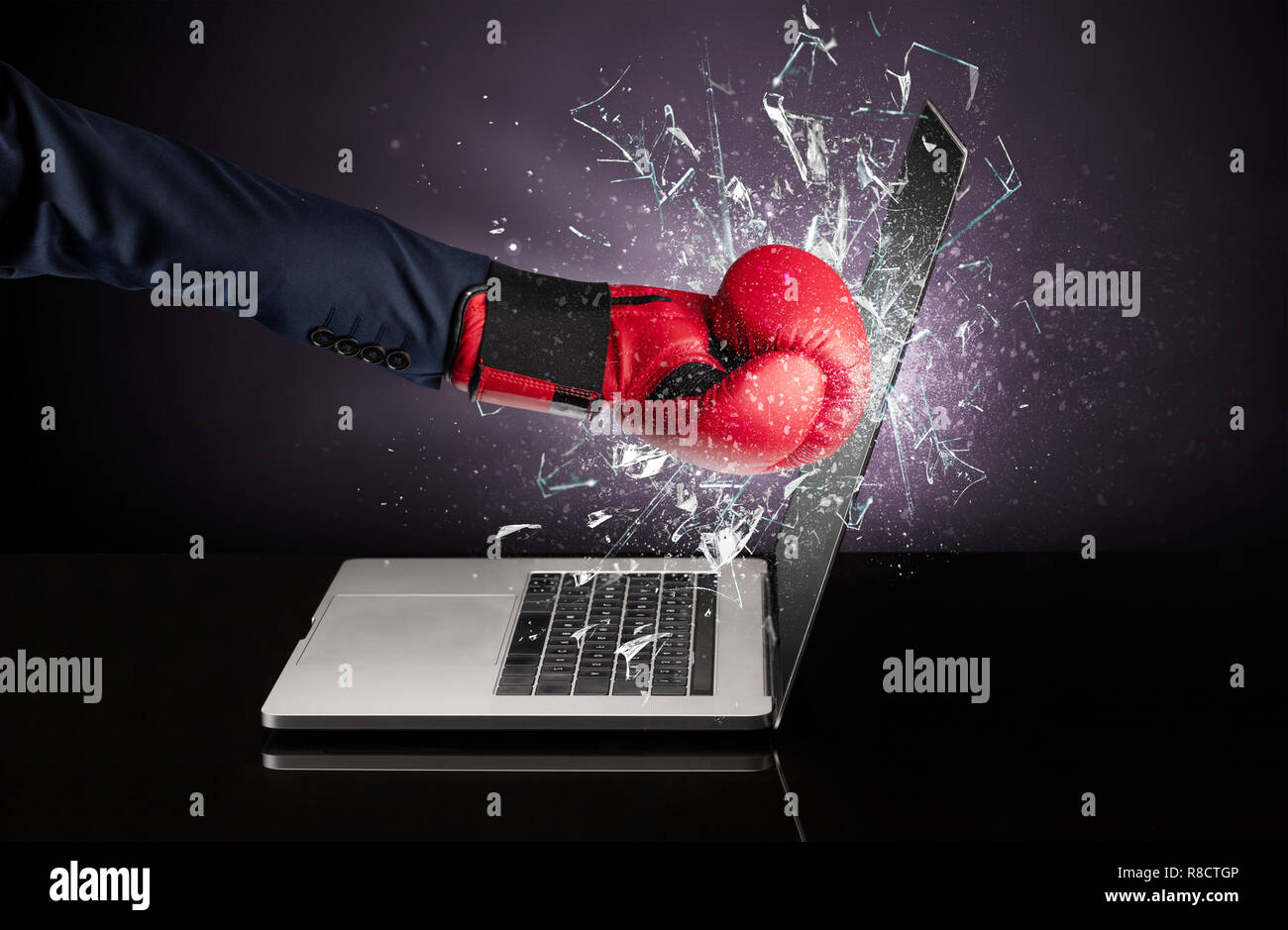 Hand hitting strongly laptop screen glass Stock Photo - Alamy