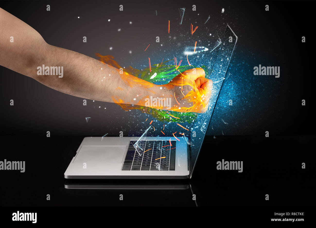 Firing hand hitting strongly laptop screen glass Stock Photo - Alamy