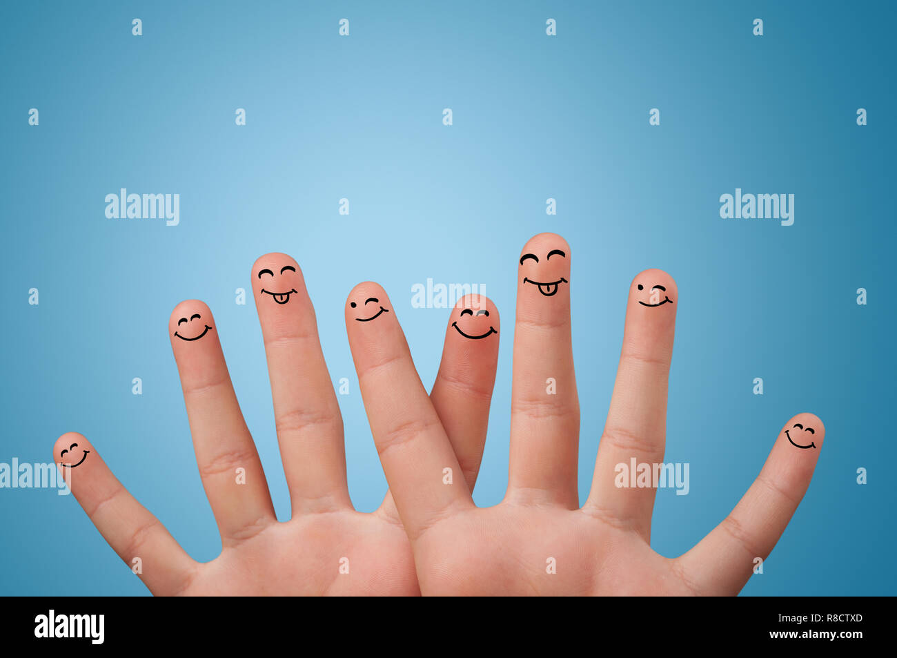 Happy face fingers hugs each other Stock Photo - Alamy