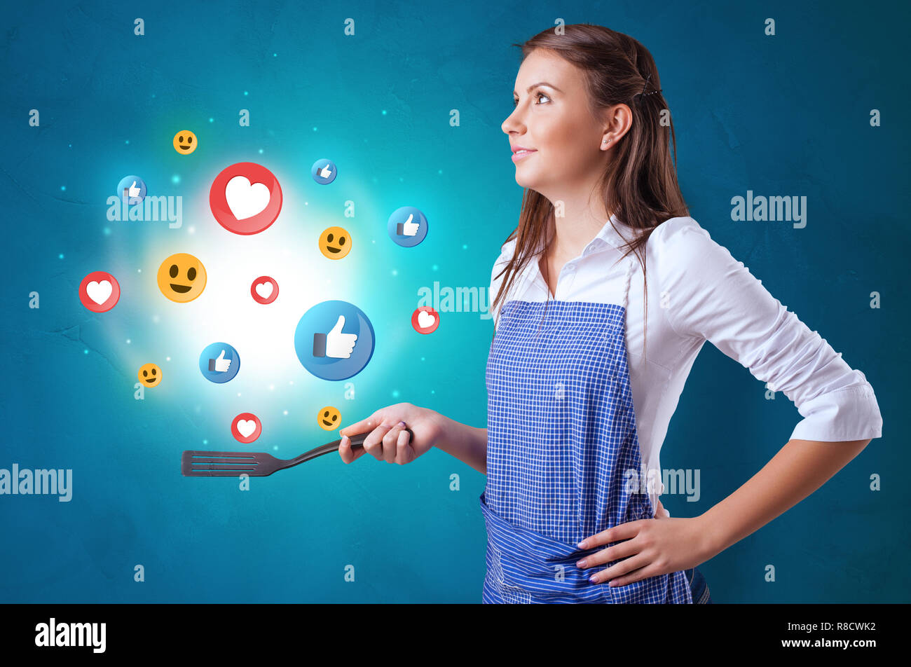 Young happy person cooking social media concept in wok Stock Photo - Alamy