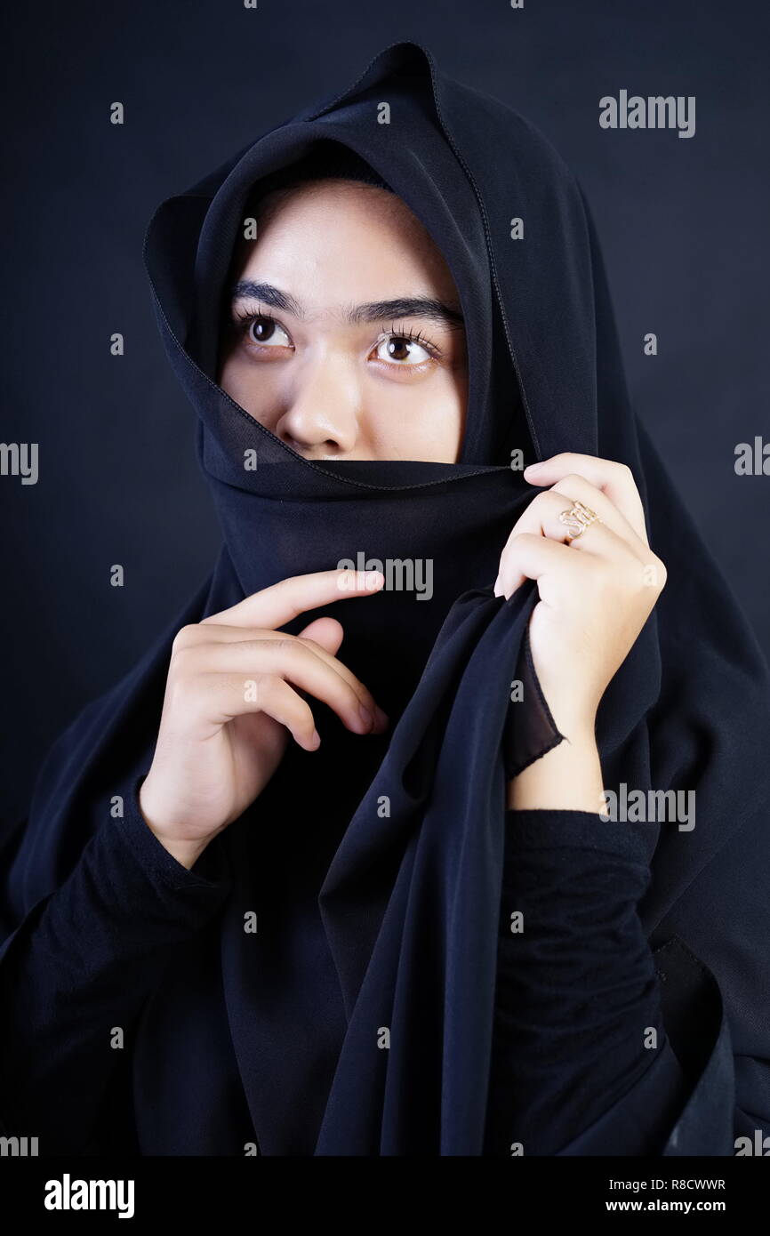 Beautiful Muslim woman wearing a burka Stock Photo - Alamy