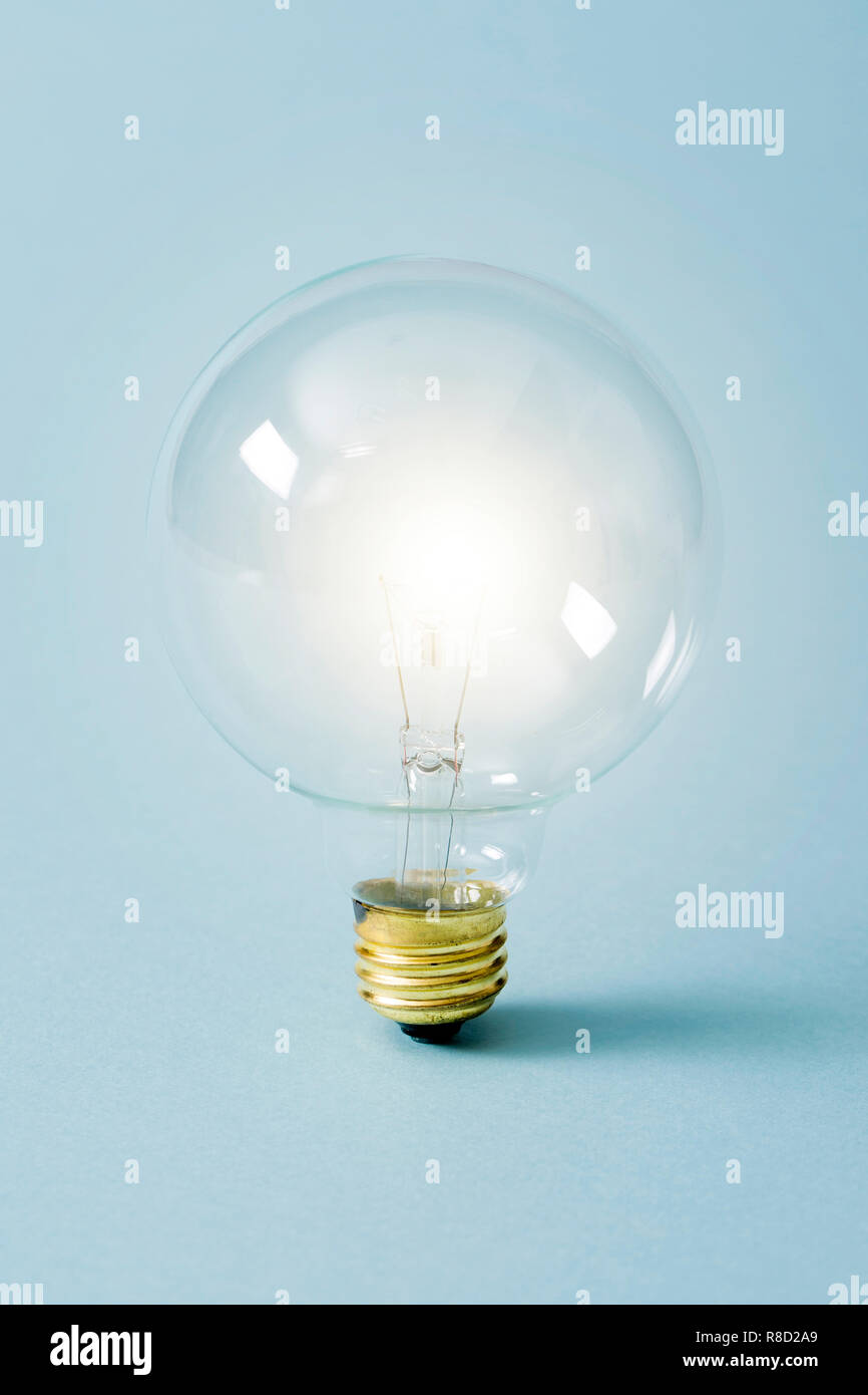 Light bulb glowing as Business idea concept with concept creative ...