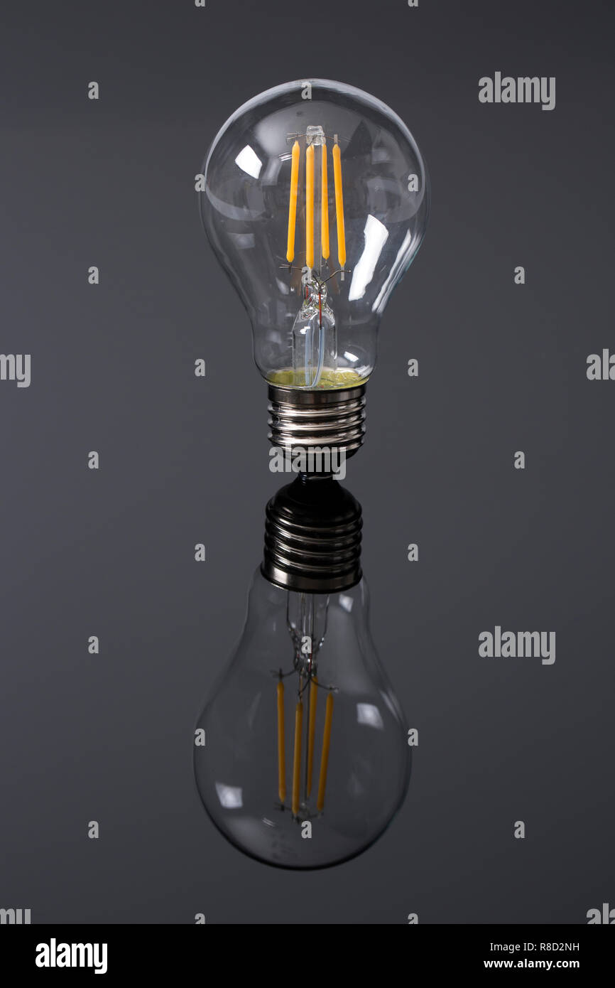 Light bulb glowing as Business idea concept with concept creative ...