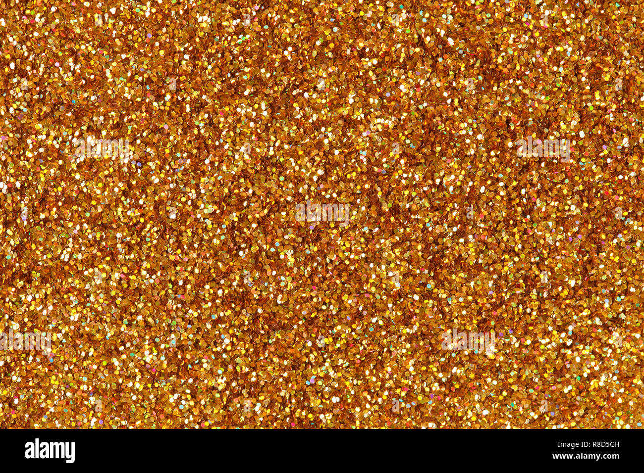 Abstract orange, gold glitter background on macro Stock Photo - Alamy