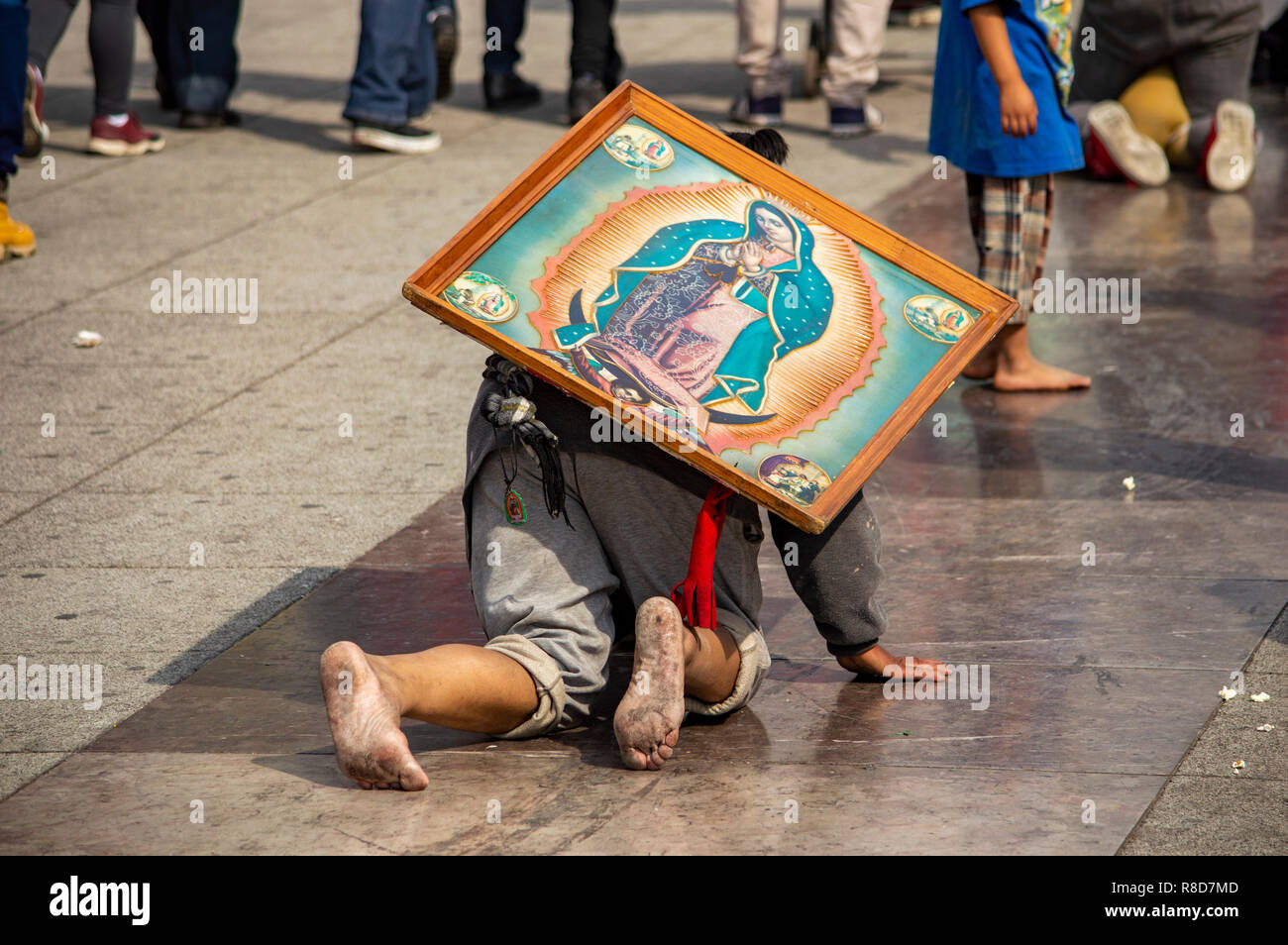 A pilgrim crawling towards the Basilica of Our Lady of Guadalupe in ...