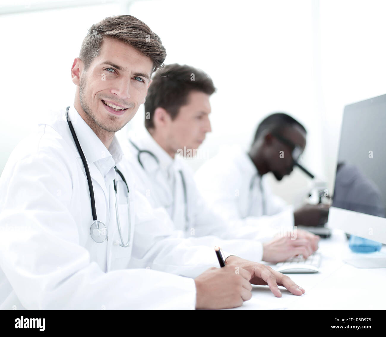 doctor write the results in the laboratory journal Stock Photo - Alamy