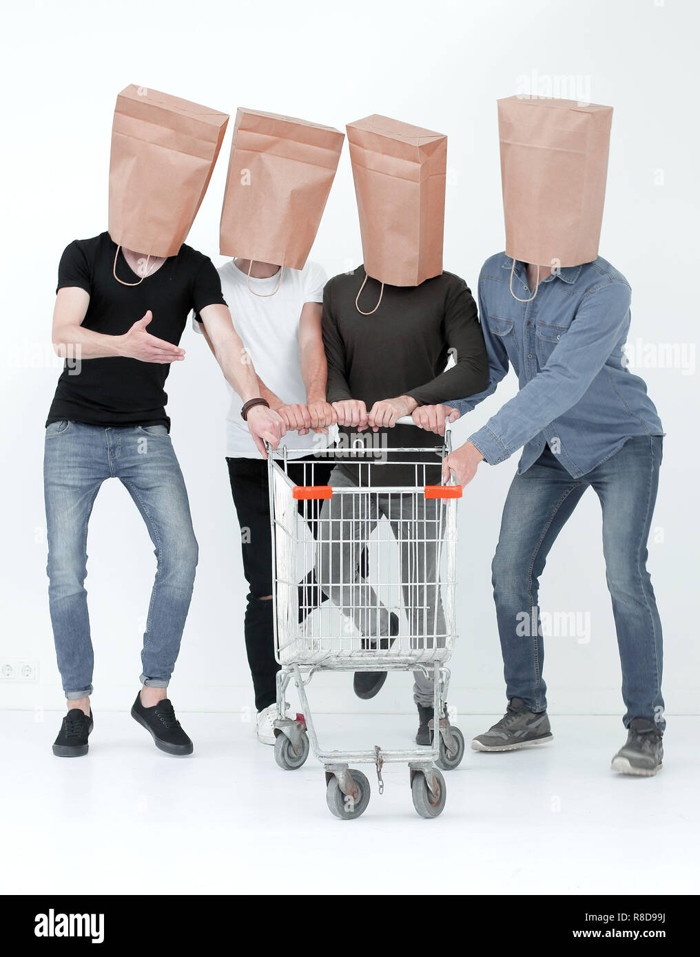 four men in a shopping concept on white Stock Photo - Alamy