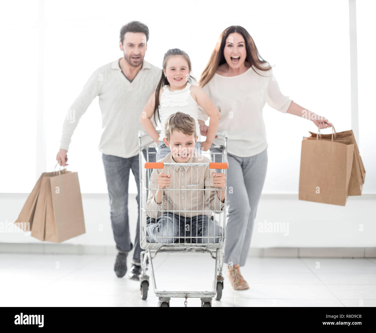 happy family with cart and kids Stock Photo - Alamy