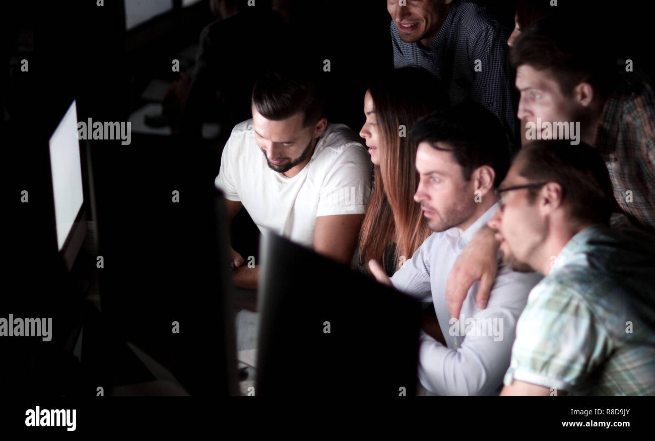successful business team in the workplace at night Stock Photo - Alamy