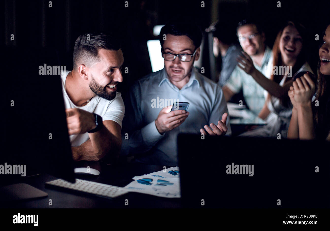 employees of the company work in the evening Stock Photo - Alamy
