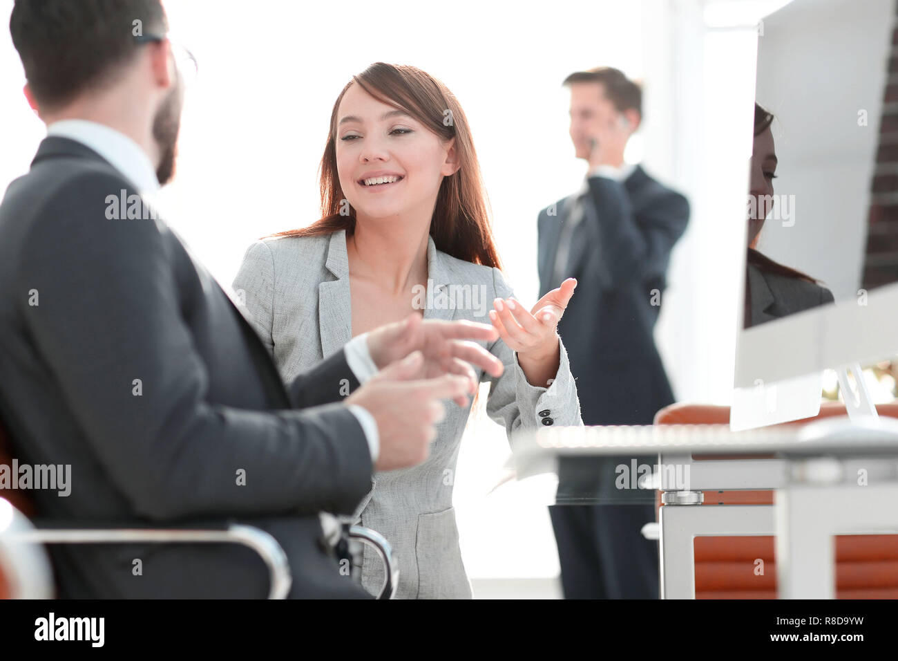 Manager and client talking in the office Stock Photo - Alamy