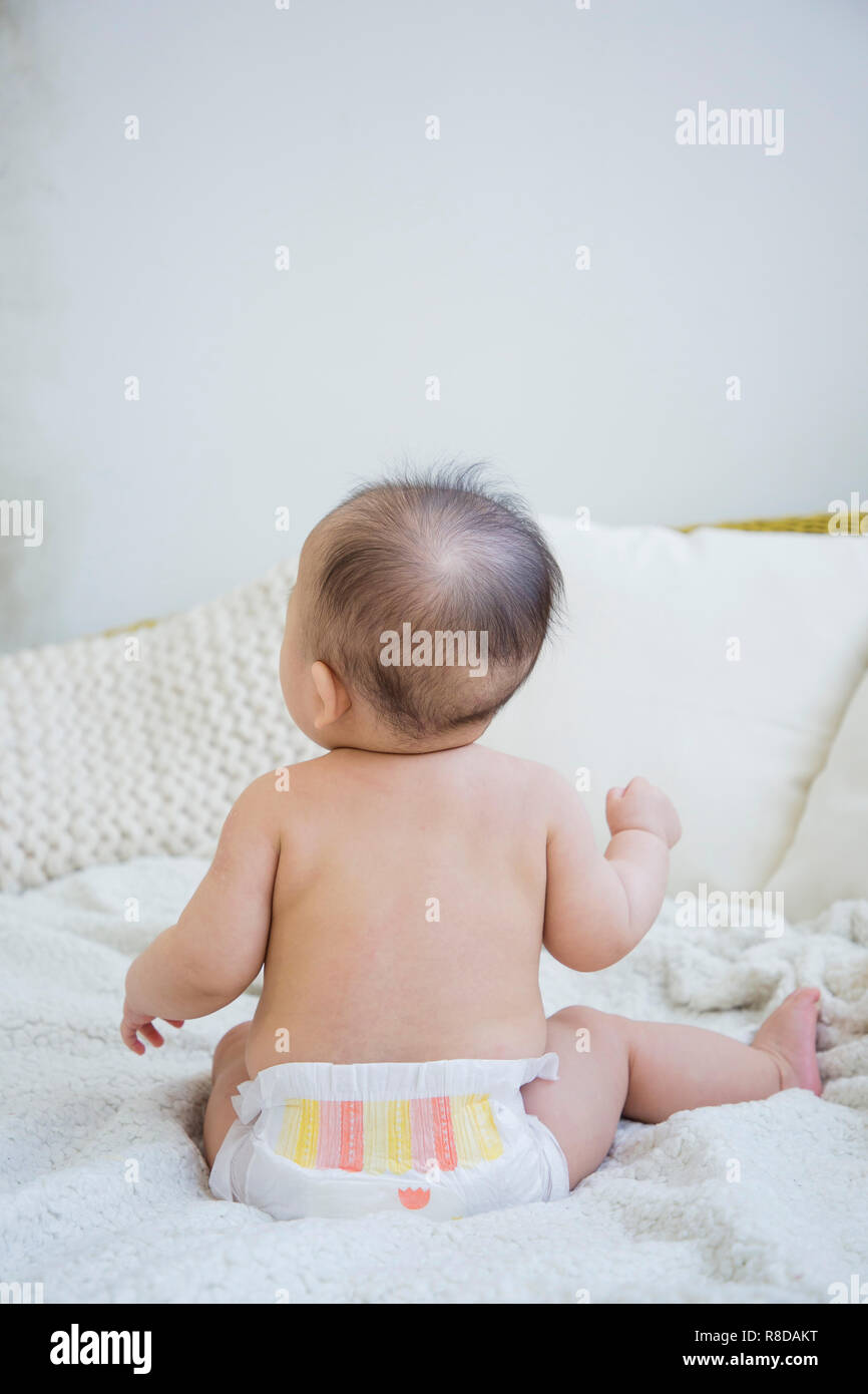 Little two cute babies photo. Baby wearing diaper in white bedroom. 079 ...