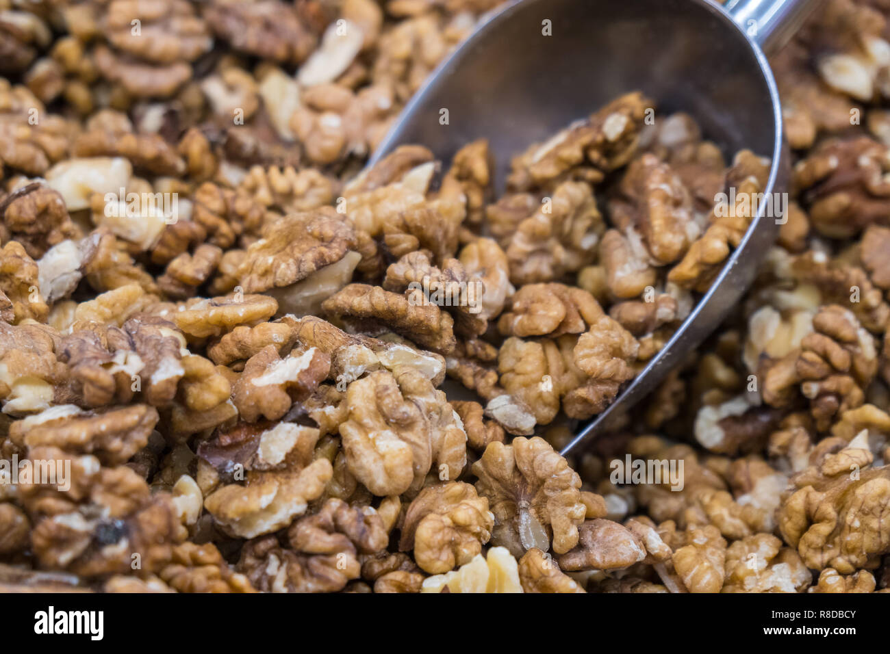 Full frame of peeled raw organic walnuts in the market. Walnut ...