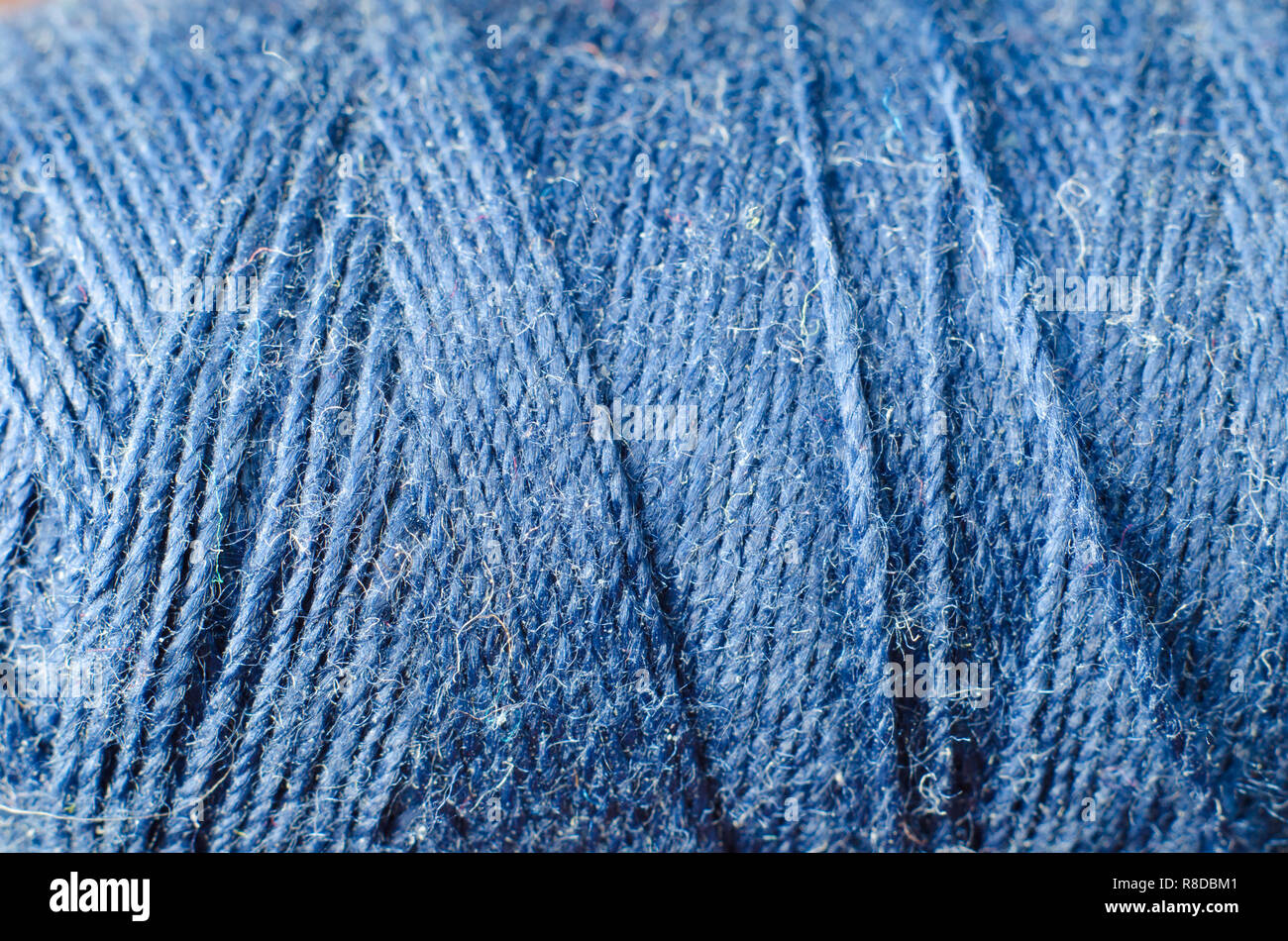 blue thread as a background Stock Photo - Alamy