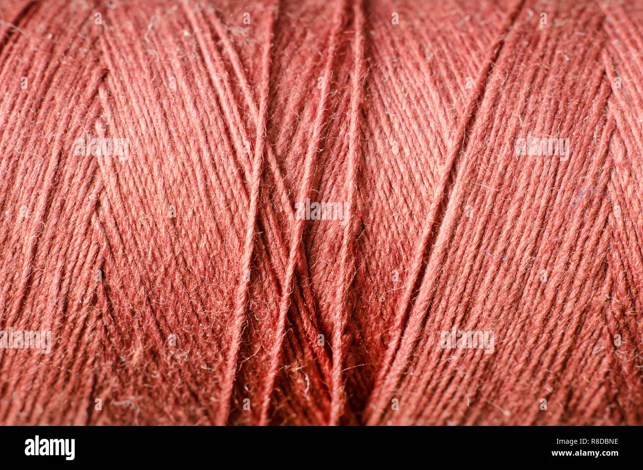red thread as a background Stock Photo - Alamy