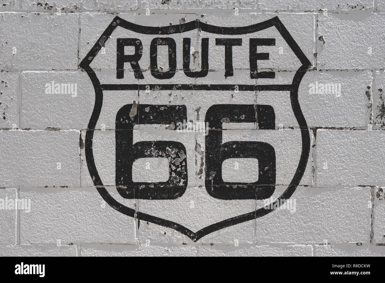 Route66 sign on a white brick wall in Williams Arizona, taken on the ...