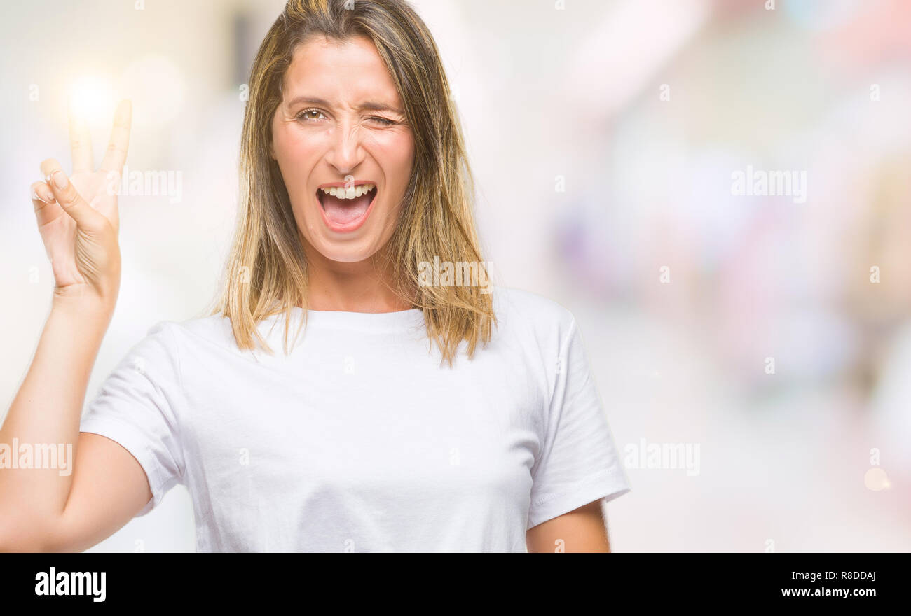 Hispanic beautiful woman winking face hi-res stock photography and ...