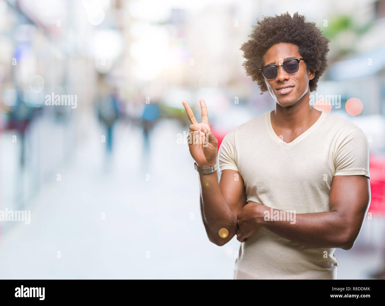 Afro american man wearing sunglasses over isolated background smiling ...