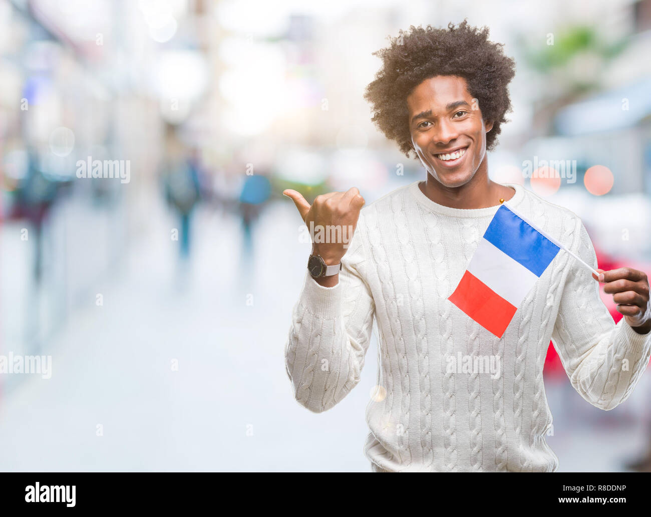 Afro american man flag of France over isolated background pointing and ...