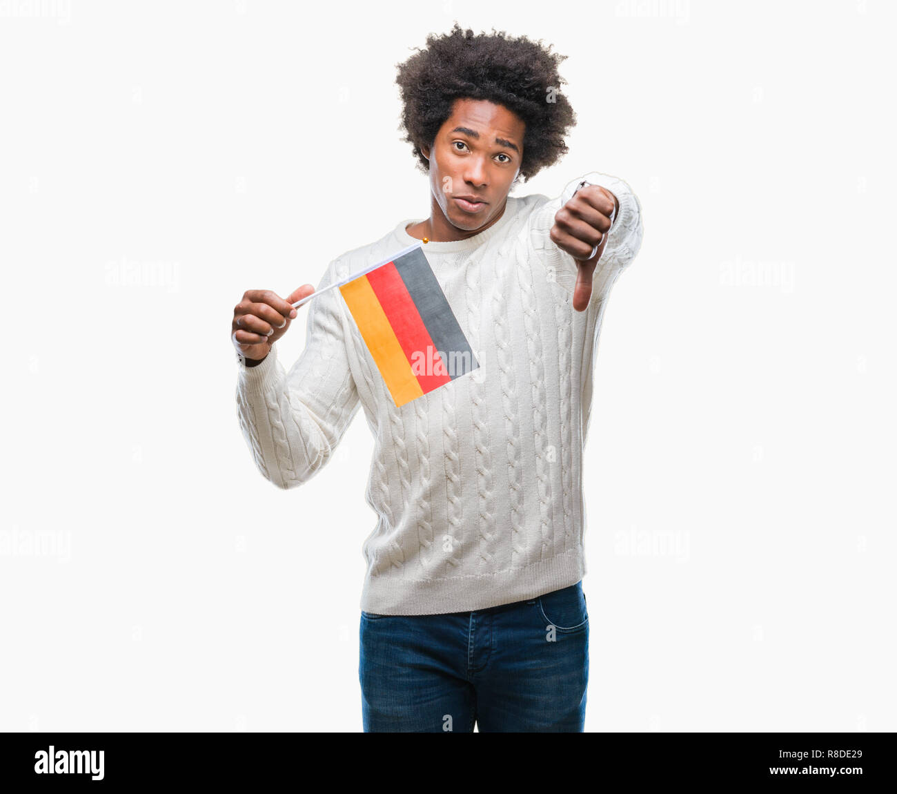 Afro american man flag of Germany over isolated background with angry ...