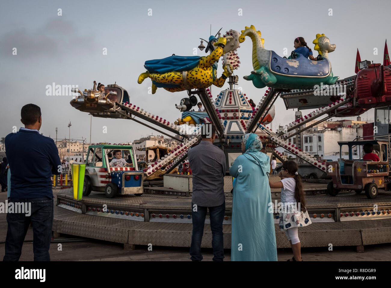 Rabat, Morocco - 24 September 2017: Kids enjoying a carousel ride in ...