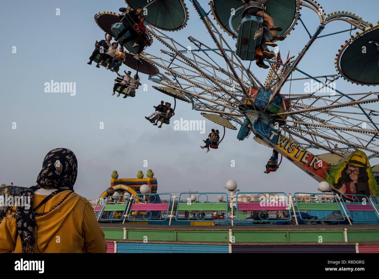 Rabat, Morocco - 24 September 2017: People enjoying a carousel ride in ...