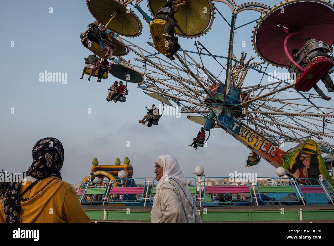 Rabat, Morocco - 24 September 2017: People enjoying a carousel ride in ...