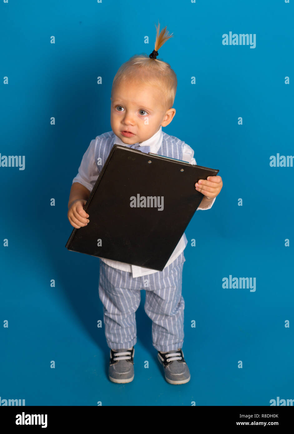 Cute leader. Small baby boss. Adorable child manage business. Small ...
