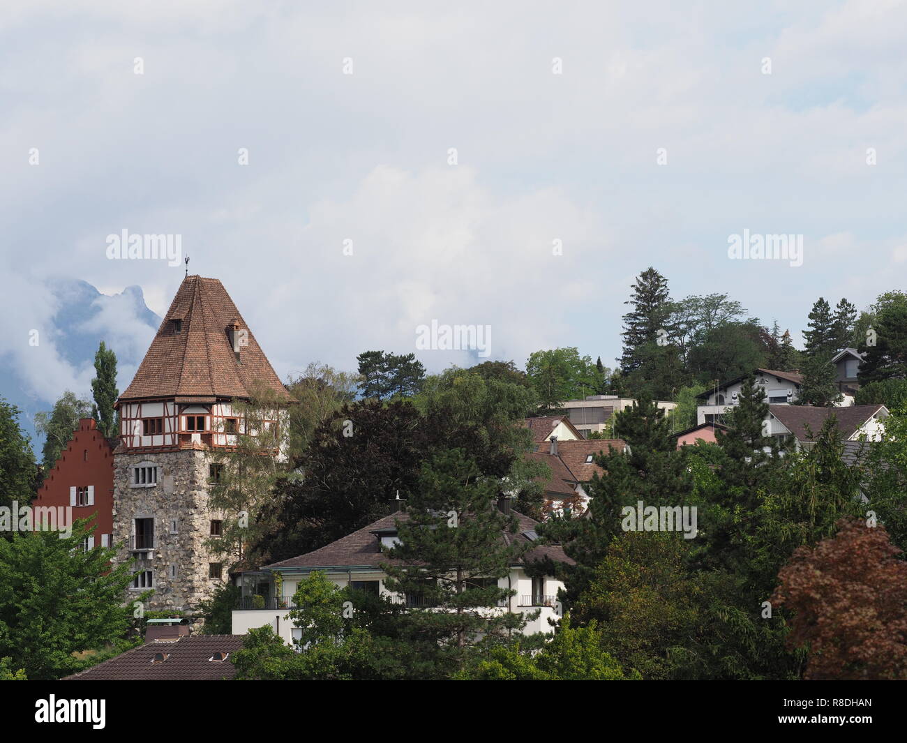 Stony tower and housing estate on hill at cityscape landscapes of ...