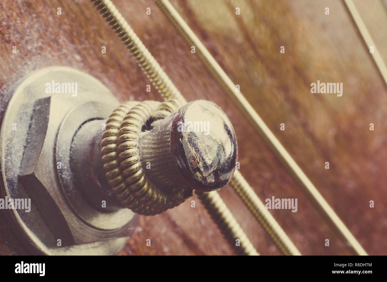 guitar peg with metal string macro Stock Photo - Alamy