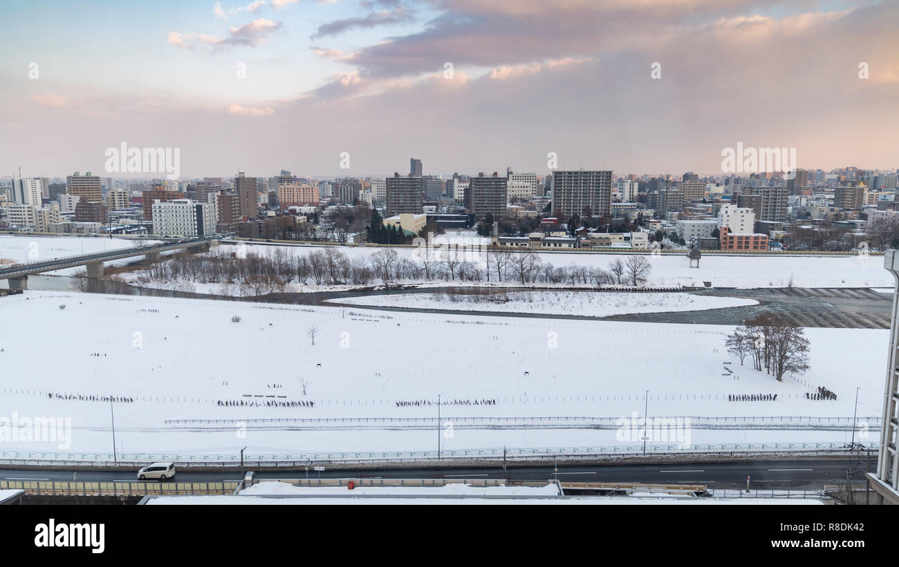Aerial view of Sapporo City by Toyohira riverside in winter. Hokkaido ...