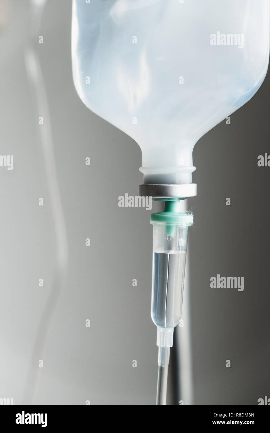 Close up of IV saline solution drip for patient in hospital Stock Photo ...