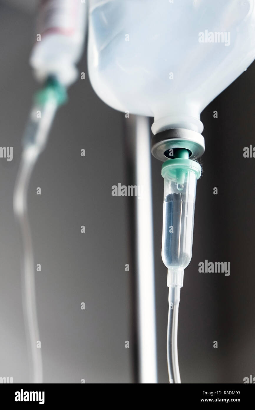 Saline solution bottle hanging hi-res stock photography and images - Alamy