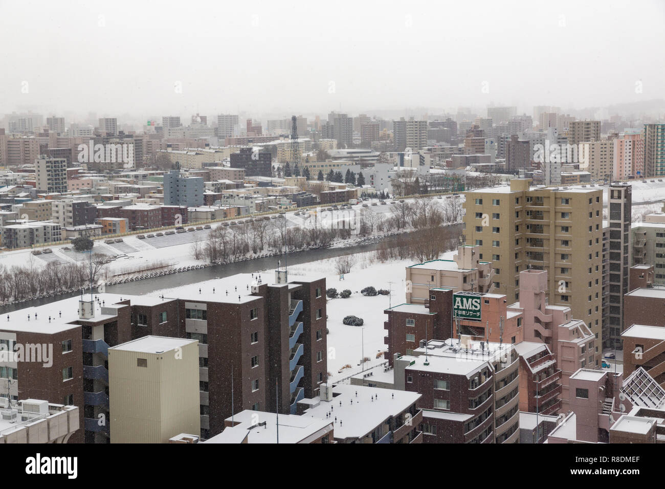 Aerial view of Sapporo City by Toyohira riverside in winter. Hokkaido ...
