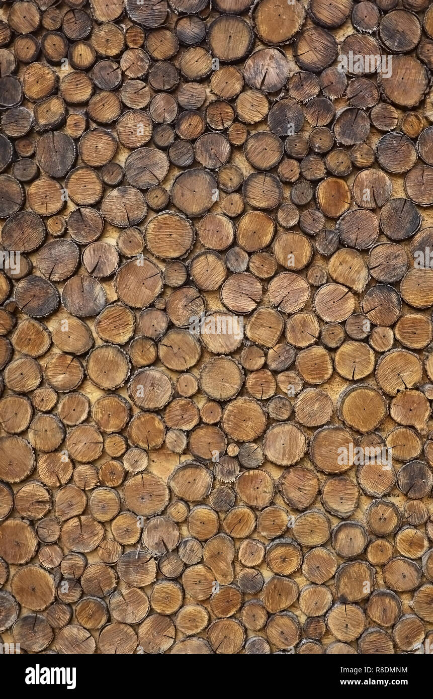 Decorative fence of wooden blocks. Rare wooden handmade wall contains ...